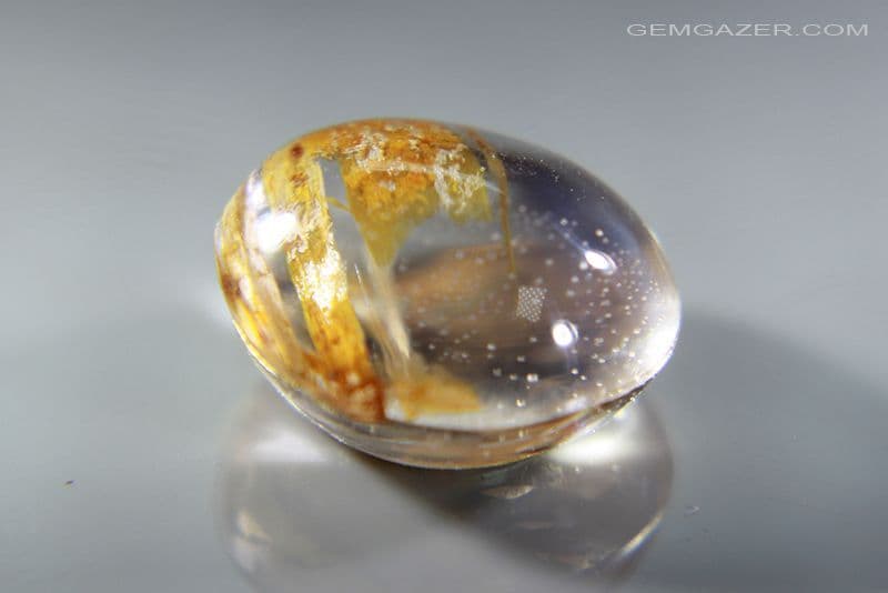 Orthoclase Moonstone cabochon with blue sheen & tube-like inclusions ...