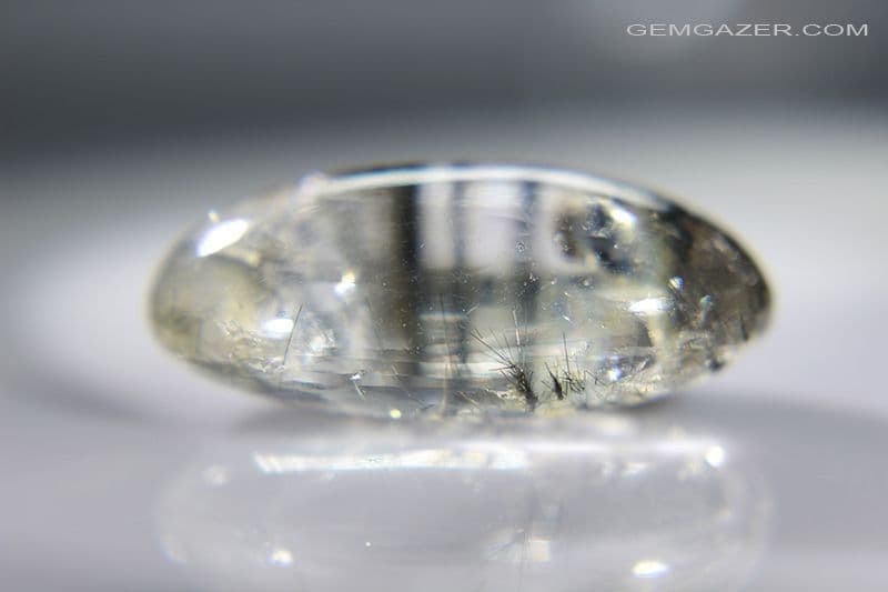 Quartz cabochon with radial green Actinolite inclusions China 31 99 carats
