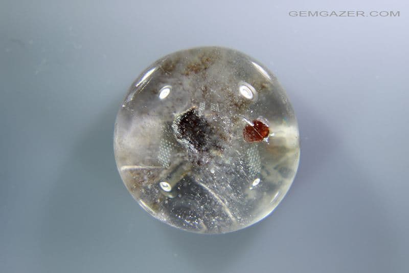 Smoky Quartz cabochon with Spessartite Garnet inclusion Brazil 9 84 carats