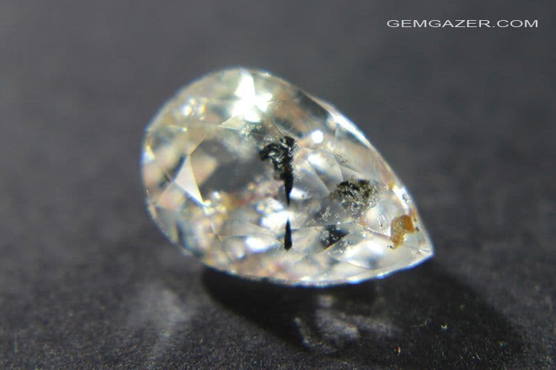 Topaz with Chlorite and iridescent Mica inclusions faceted Brazil 2 80 ...