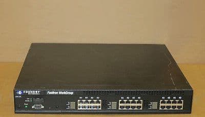 Foundry FastIron Workgroup 24-Port Fast Ethernet 1 Gigabit Port Network ...