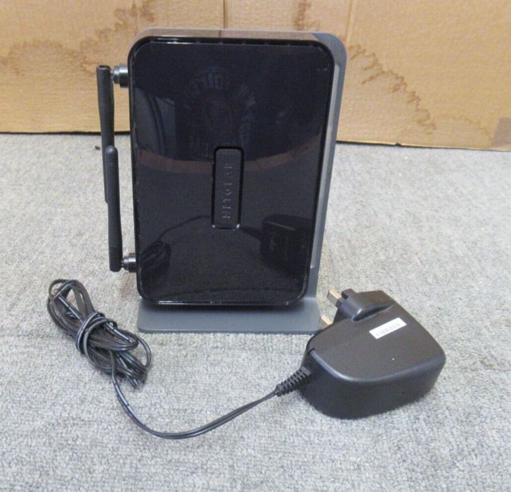 Netgear DGN2200 4 Port Wireless Router IEEE 802 11n ISM Band 300 Mbps USB