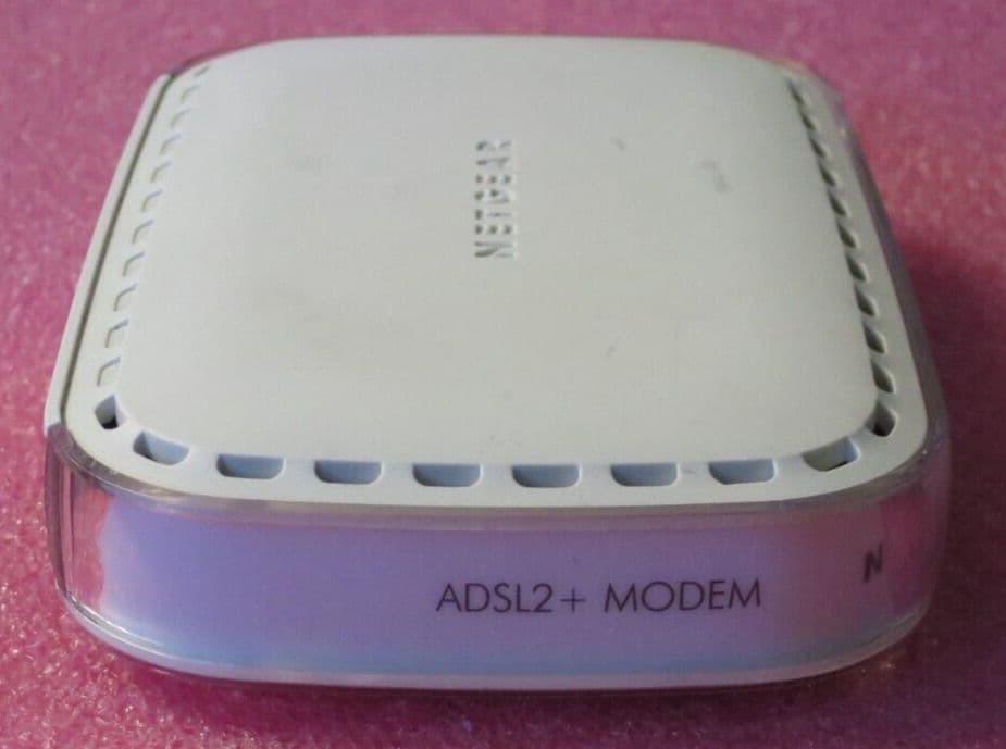 Netgear DM111P Wired ADSL2 Ethernet Modem 272-10384-01 With AC Adapter