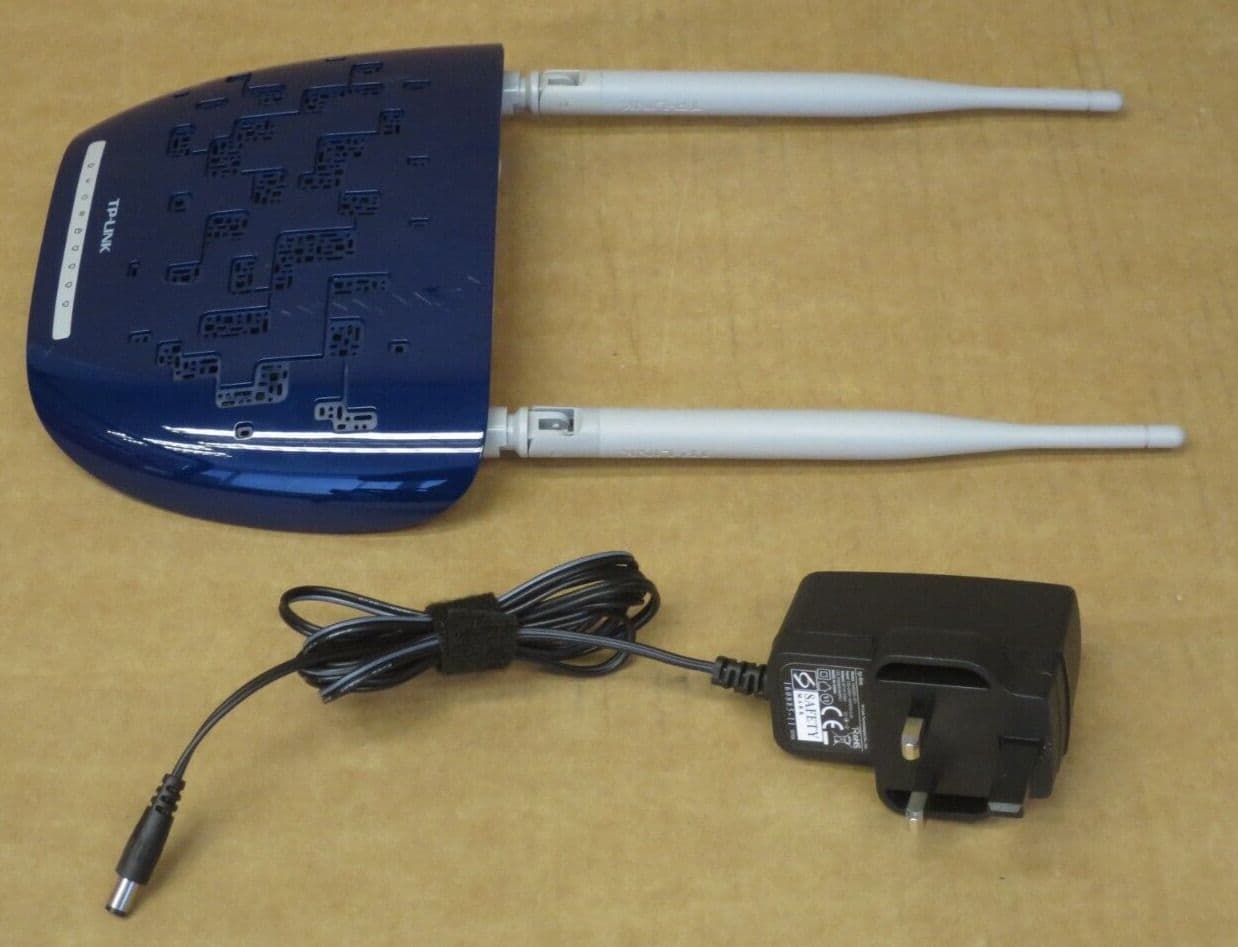 TP-Link TD-W8960N 4-port Switch External Wireless Router With AC Adapter