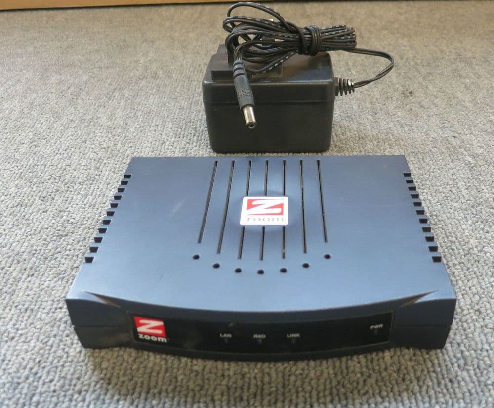 Zoom 5551 Series 1011 Ethernet USB ADSL x4 Modem With AC Power Adapter