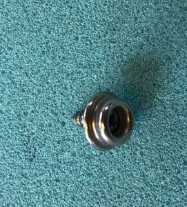 Self tapping nickel press stud