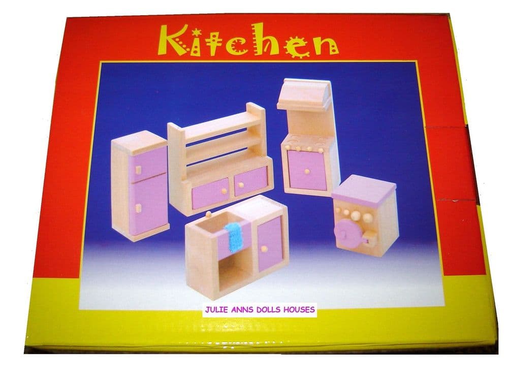 Pink dolls house kitchen set