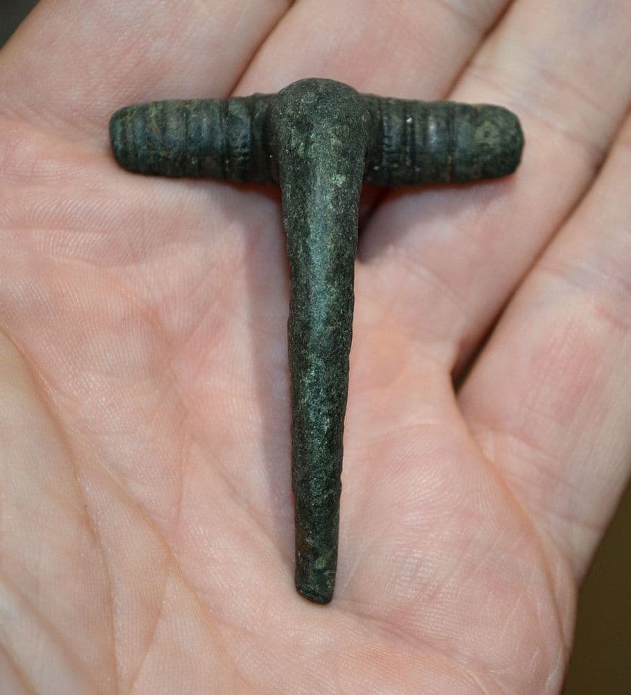 A large and impressive Roman bronze "Dolphin" fibula brooch from the ...