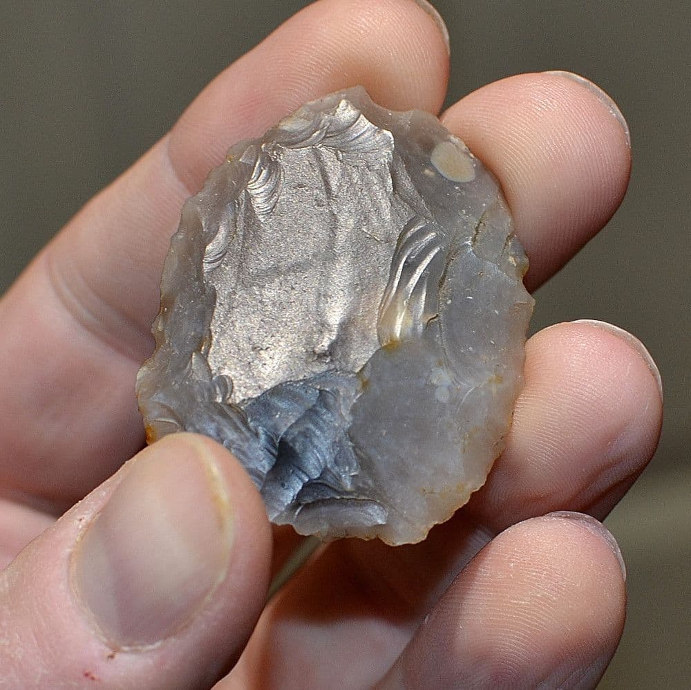 A nicely worked Neolithic semi-translucent discoidal flint scraper tool ...