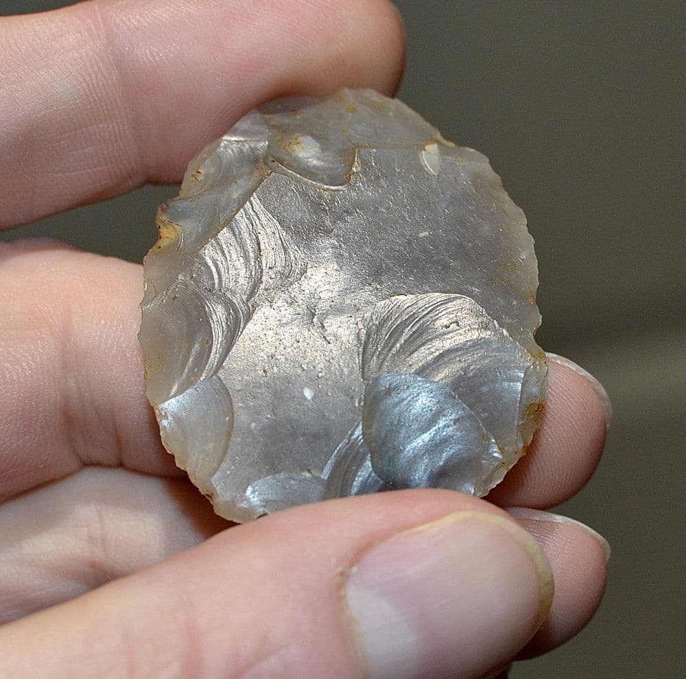 A nicely worked Neolithic semi-translucent discoidal flint scraper tool ...