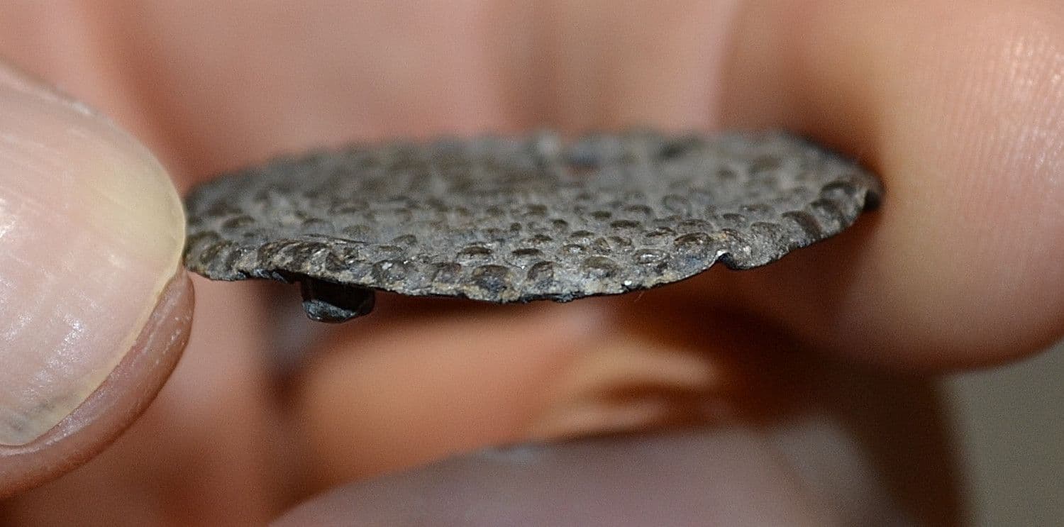 A rare late Anglo Saxon / Viking lead-pewter disc brooch featuring a ...