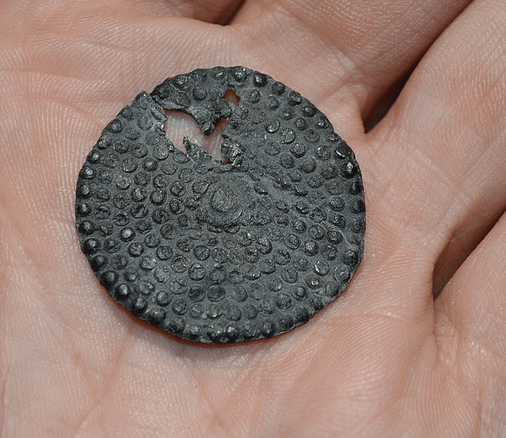 A rare late Anglo Saxon / Viking lead-pewter disc brooch featuring a ...