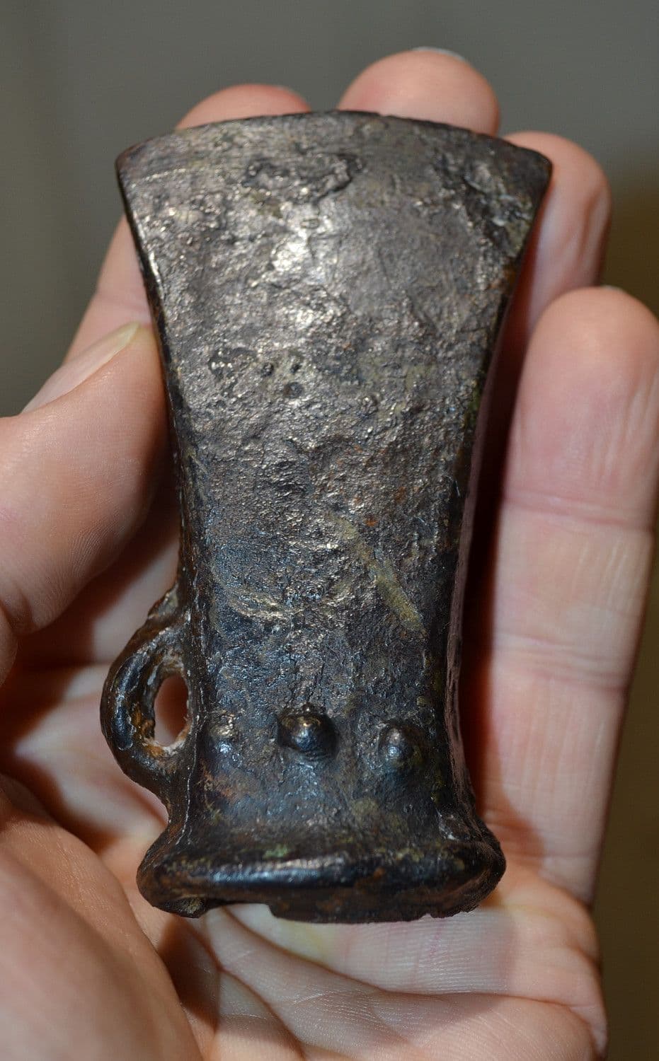A rare Late Bronze age bronze socketed axe head with embossed pellet ...