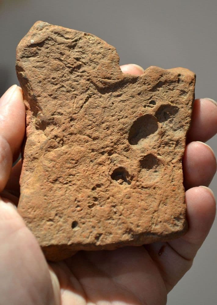 A Roman terracotta roof tile fragment from the River Thames London ...