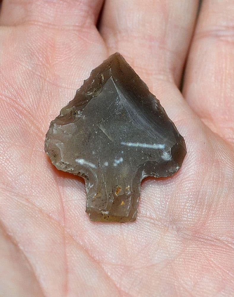 A sizeable excellent and well worked Neolithic Tanged flint arrowhead ...