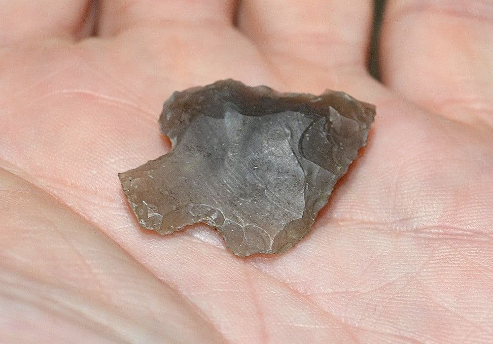 A sizeable excellent and well worked Neolithic Tanged flint arrowhead ...