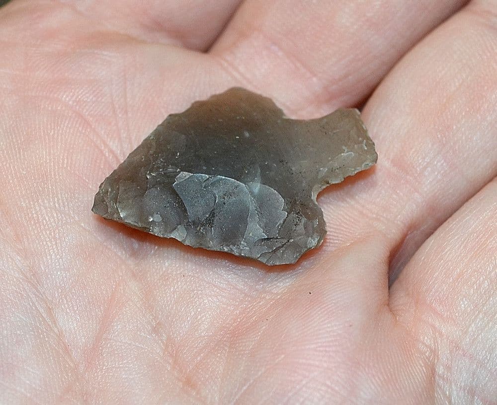 A sizeable excellent and well worked Neolithic Tanged flint arrowhead ...