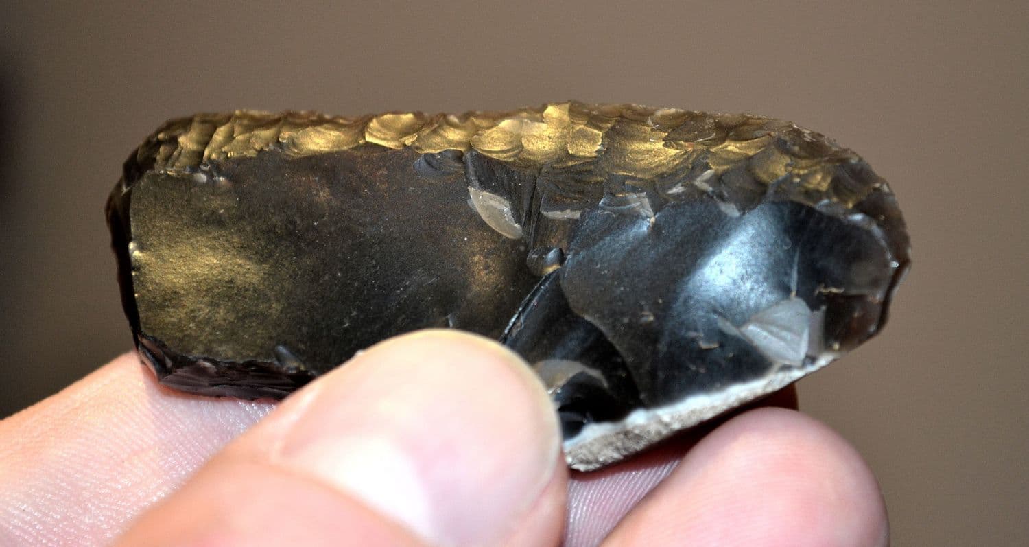 A superb Neolithic flint knife featuring a finely pressure flaked blade ...