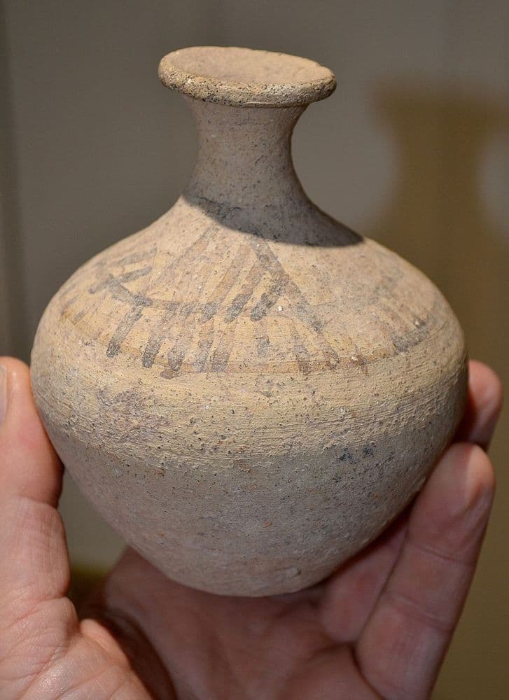 An excellent and appealing Bronze Age Cypriot vase with painted ...