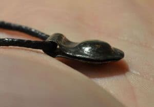 An extremely rare complete and wearable Roman boys bronze "Bulla ...