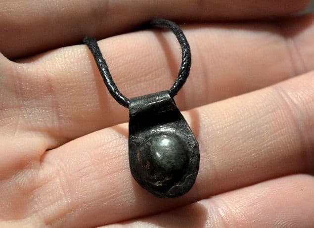 An extremely rare complete and wearable Roman boys bronze "Bulla ...