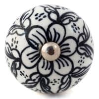 White/black flower pattern knob