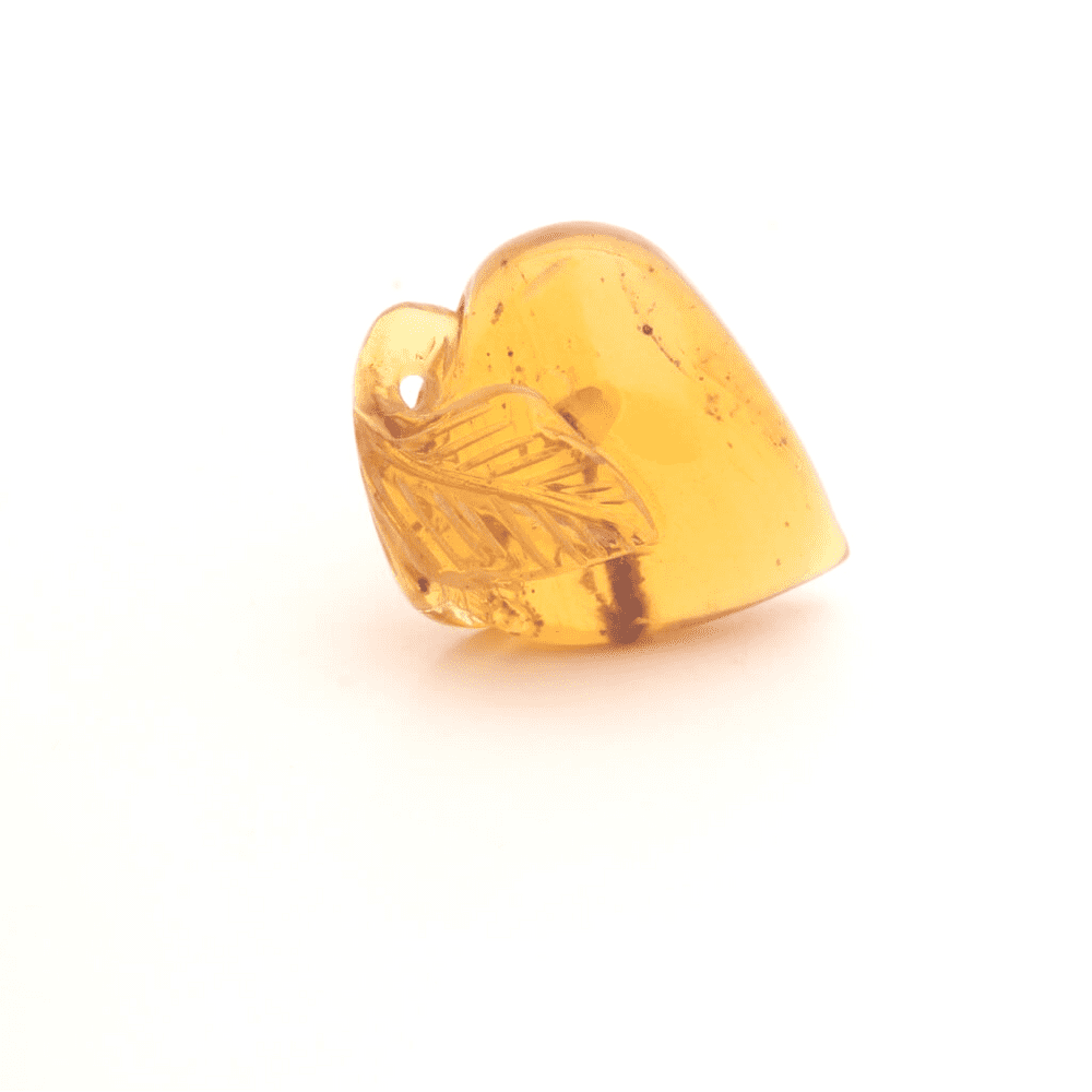 Green Man carved in Amber