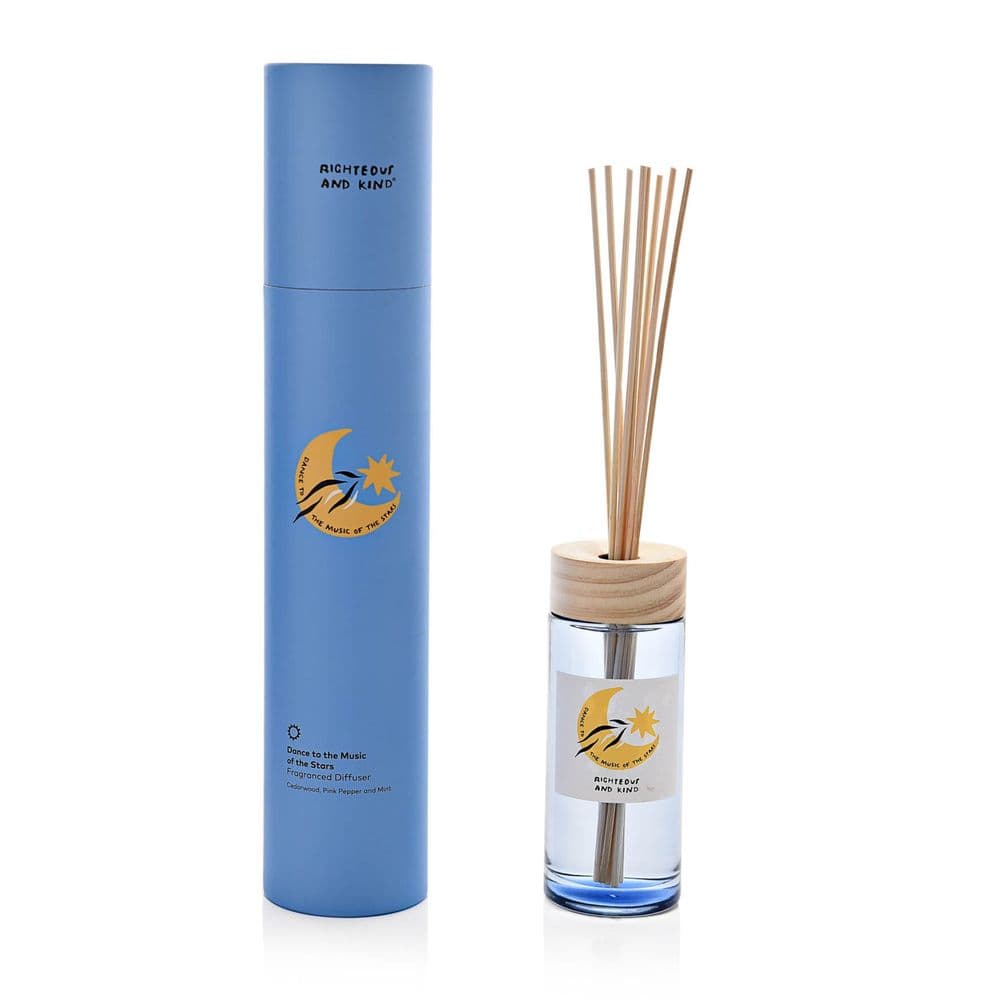 Righteous and Kind Scented Moon reed diffuser in blue tinted jar. A ...
