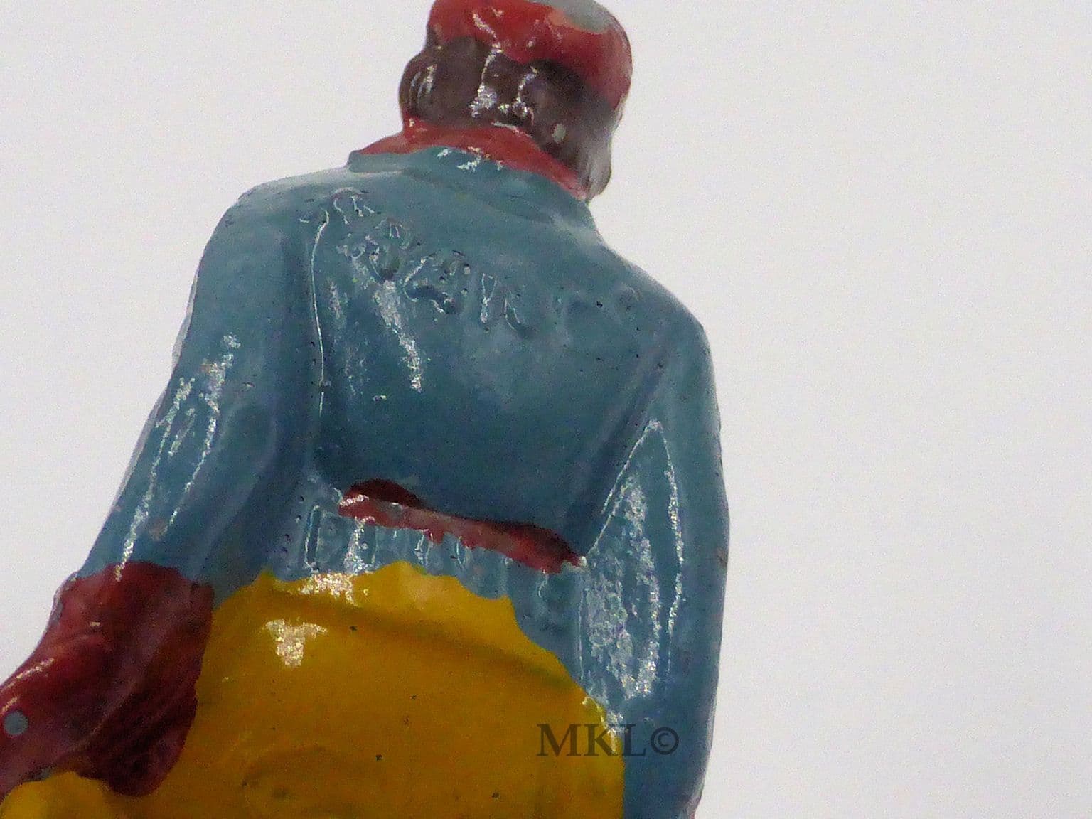 Vintage Lead Figure - Person Sitting on Sled