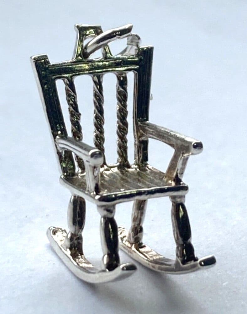 Silver charm of a traditional rocking chair