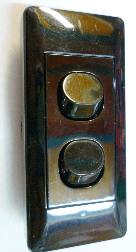 Clipsal double architrave switch 12v black