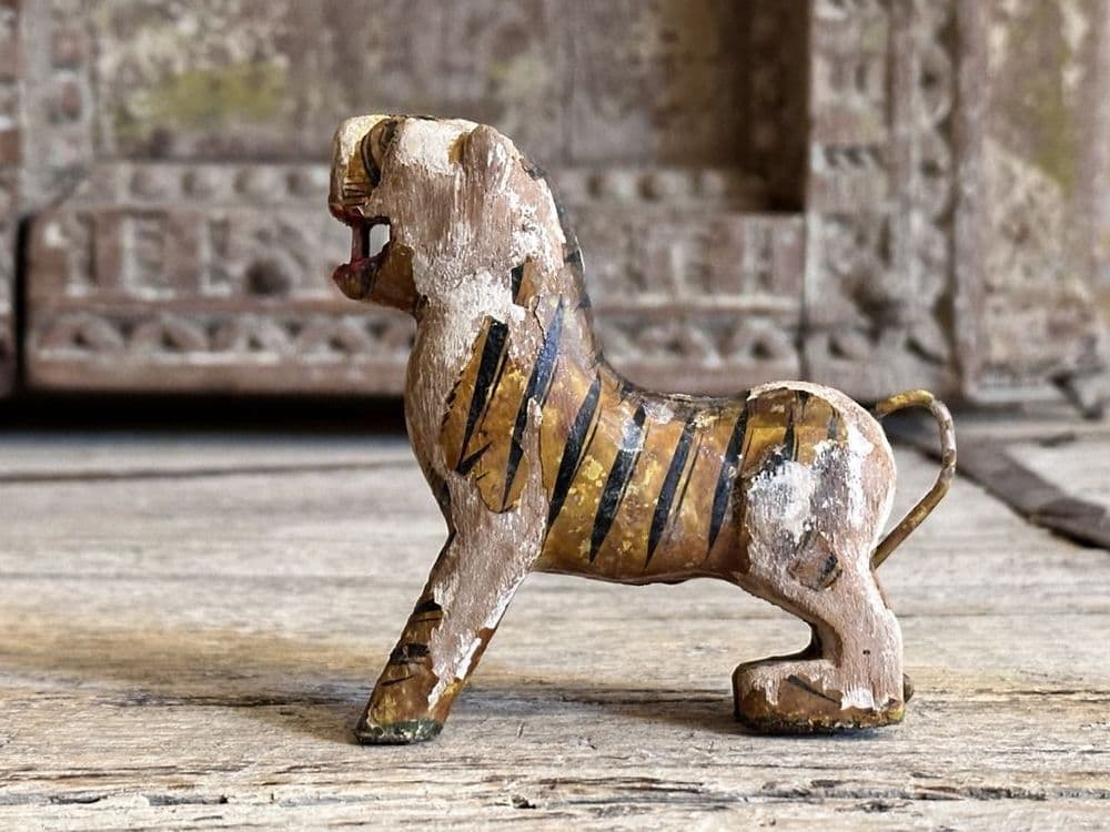 Vintage polychrome wooden tiger avatar of the goddess Durga