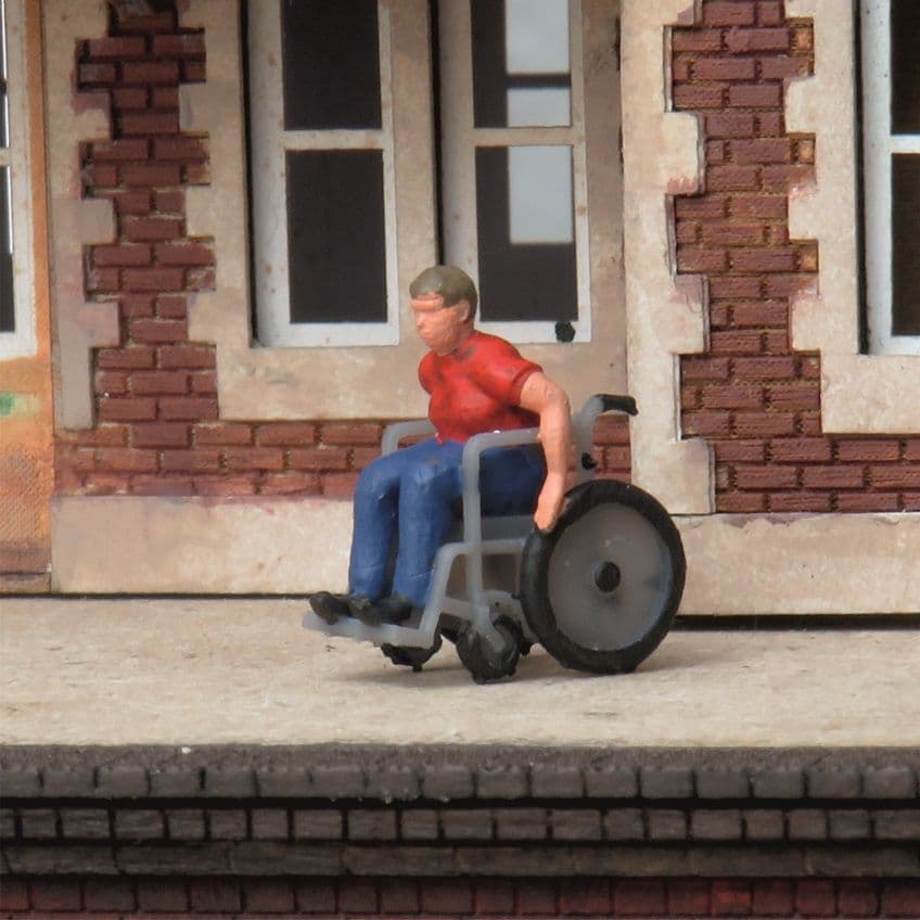 OSBF0016 HO scale Man in Wheelchair