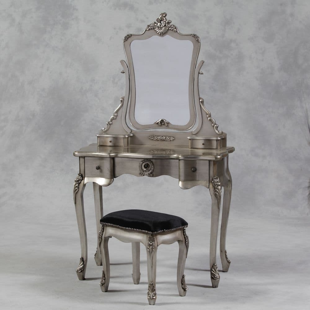A Dressing Table Set in Antique Silver