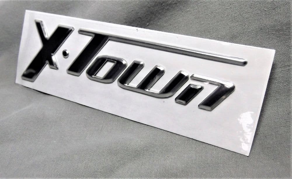 Kymco X-Town 125/300 Chrome Emblem 86202-ACJ1-E60-T01