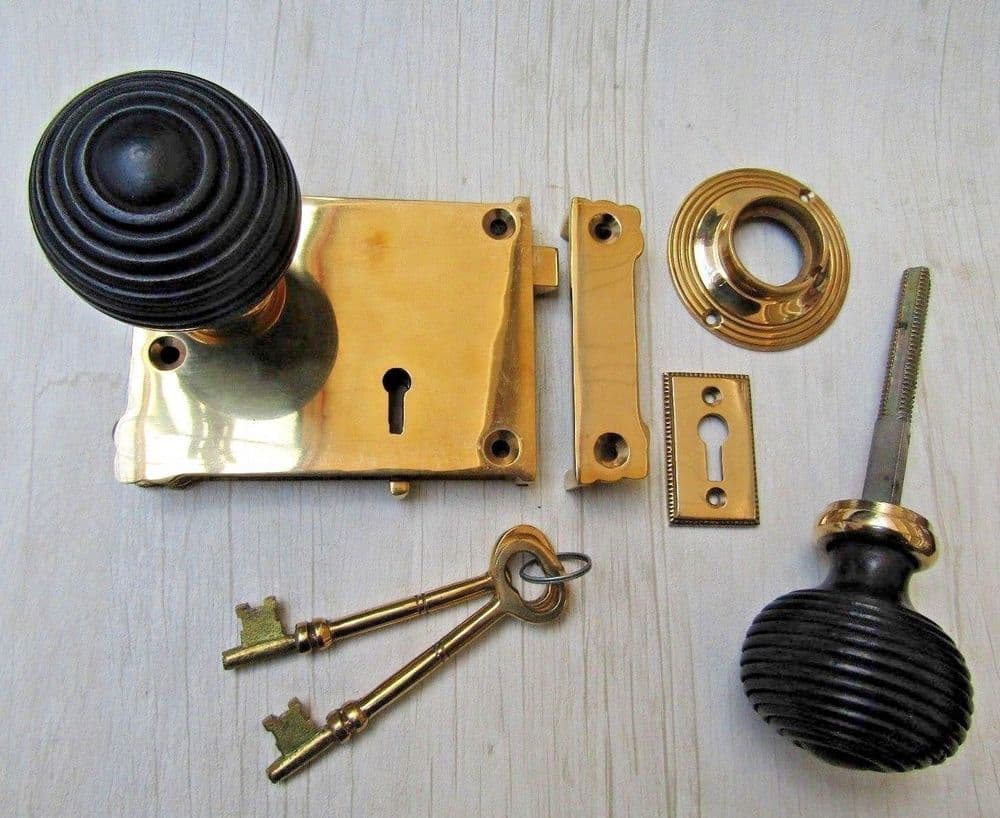 East Lake Rim Lock & Beehive Ebony Brass Set