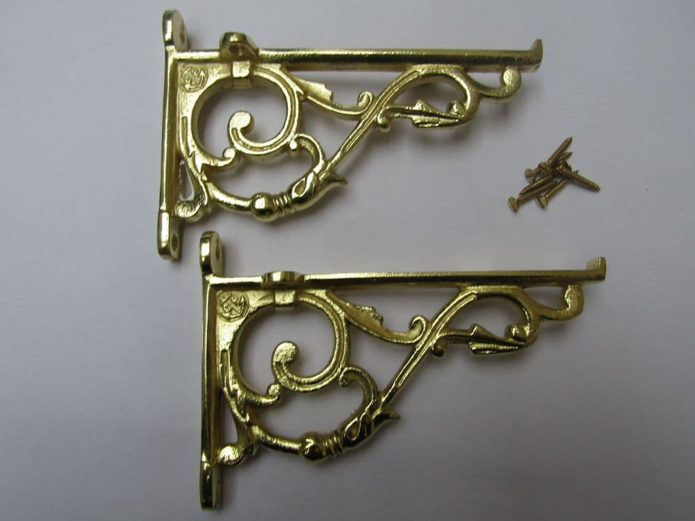 Pair Of Small Lipped Shelf Brackets Polished Brass