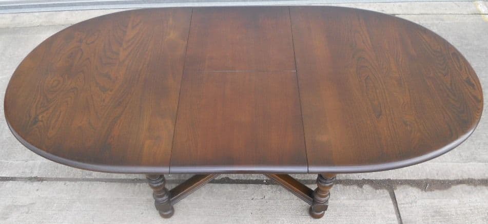 Large Oval Dark Elm Extending Dining Table to Seat Eight