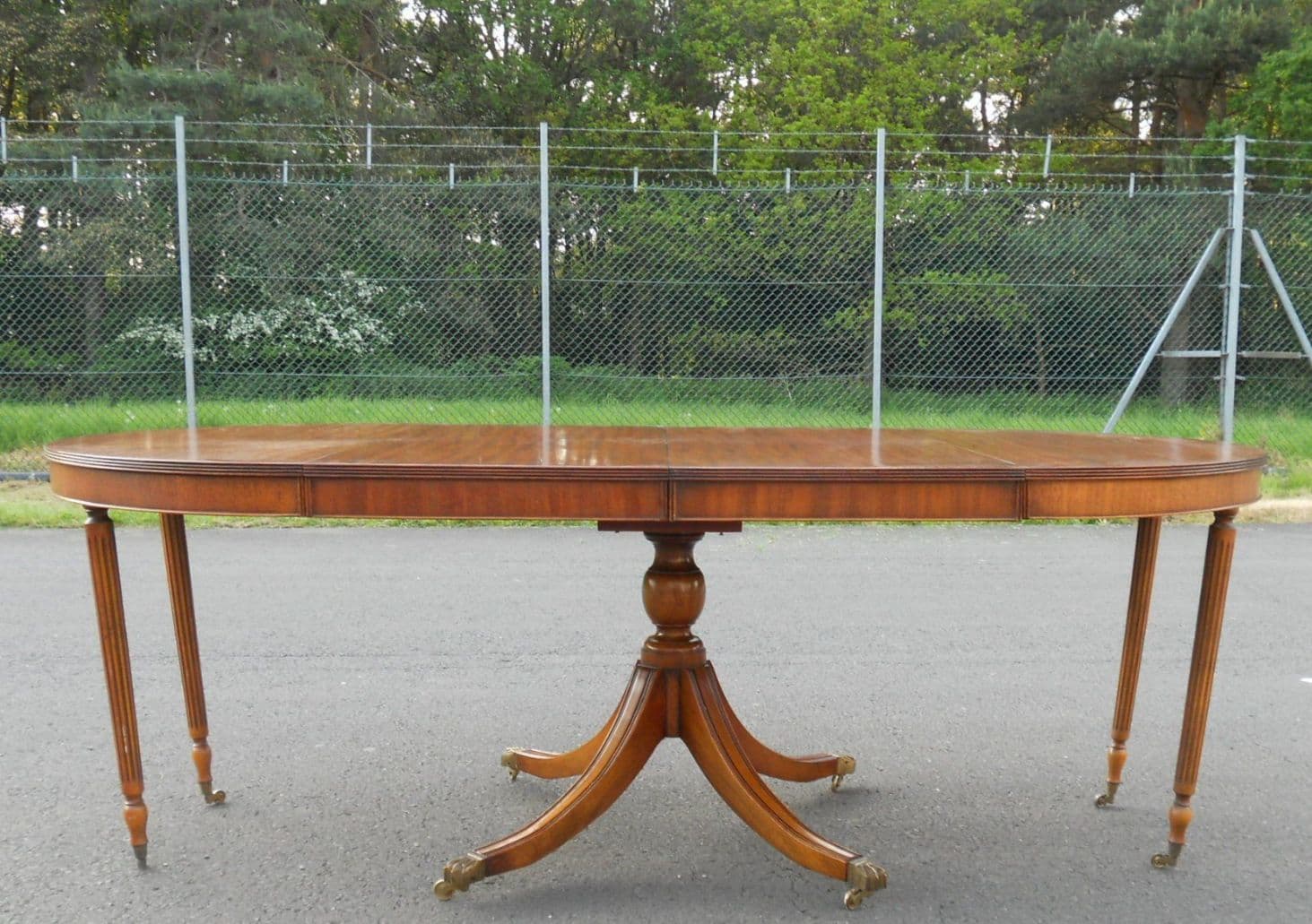 Round Yew Extending Dining Table to Seat Eight