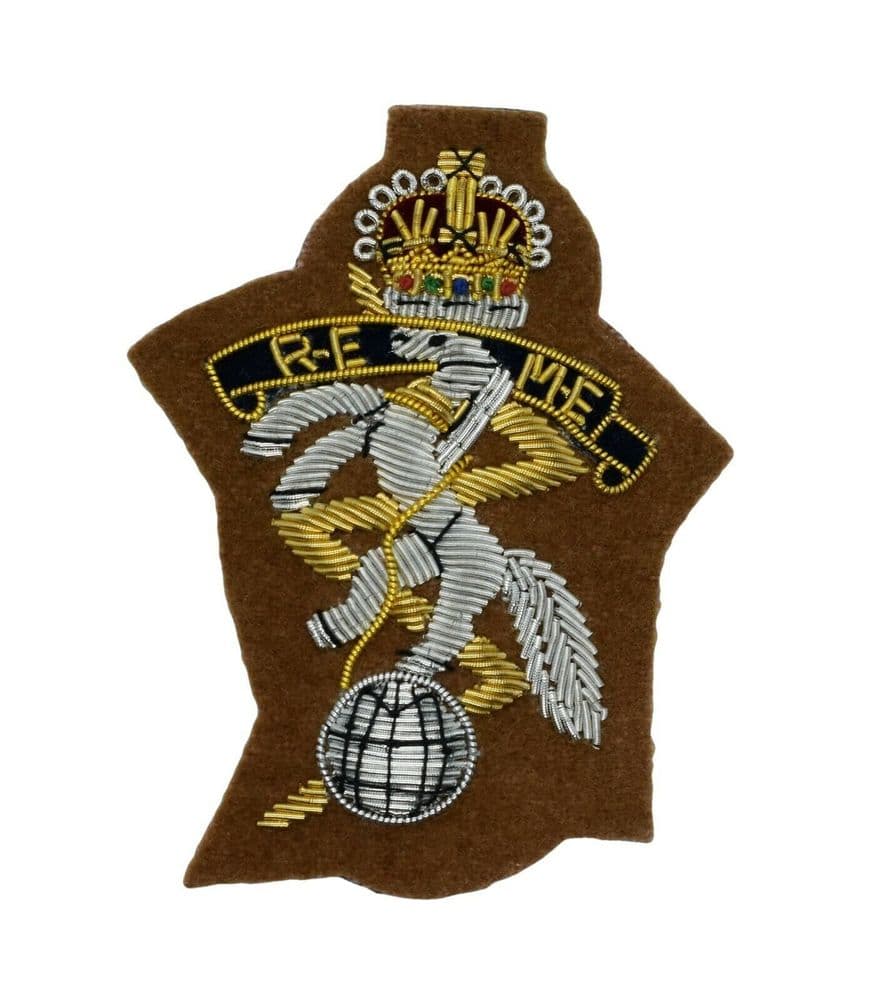 REME Royal Electrical Mechanical Engineers Officers Cap Badge On Sand