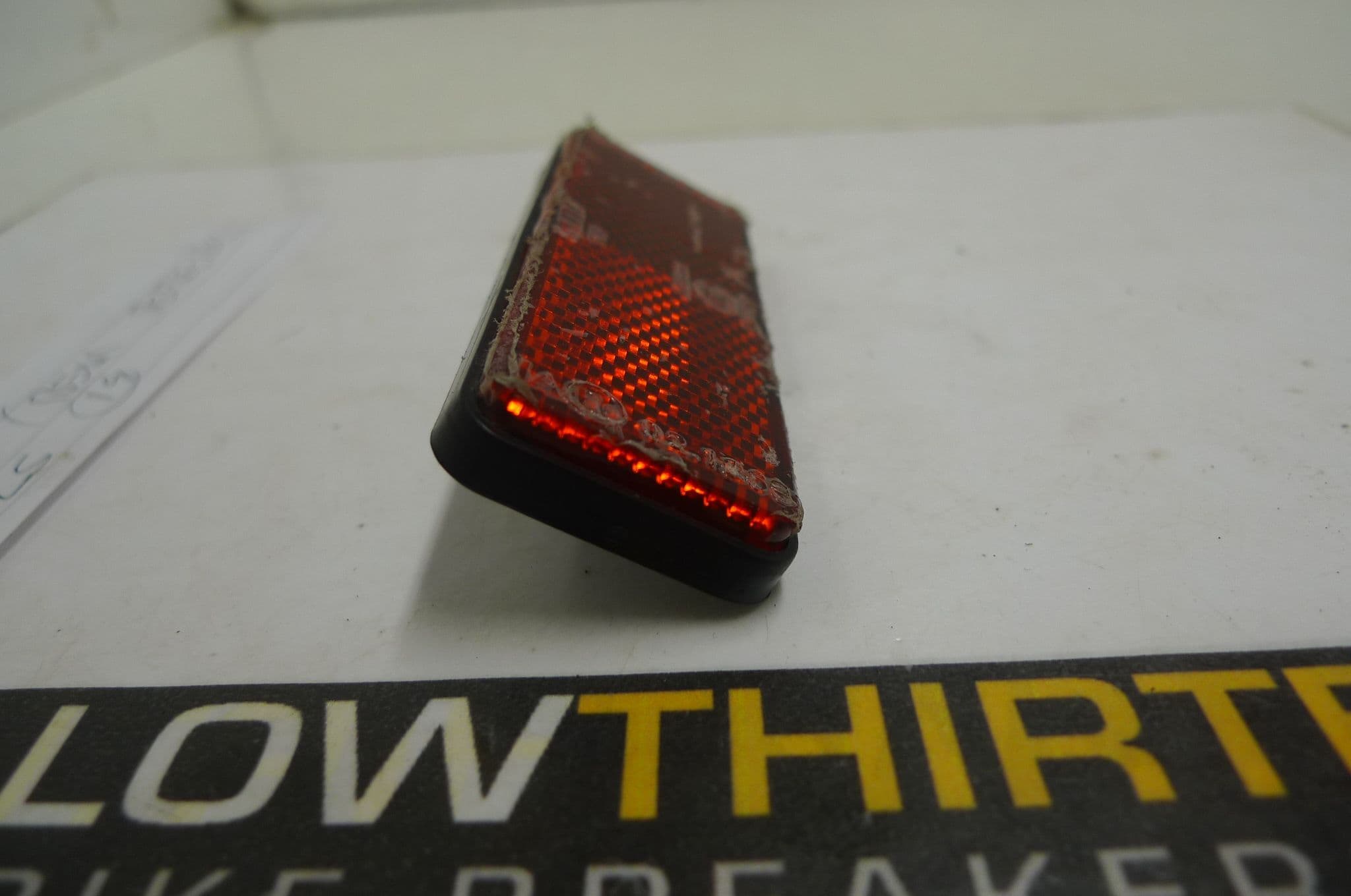 LEXMOTO LXR125 REAR REFLECTOR LOC-A